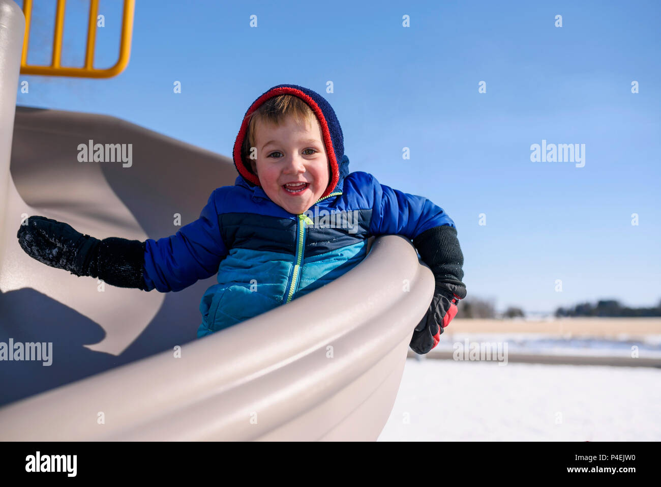 Children sliding hi-res stock photography and images - Alamy