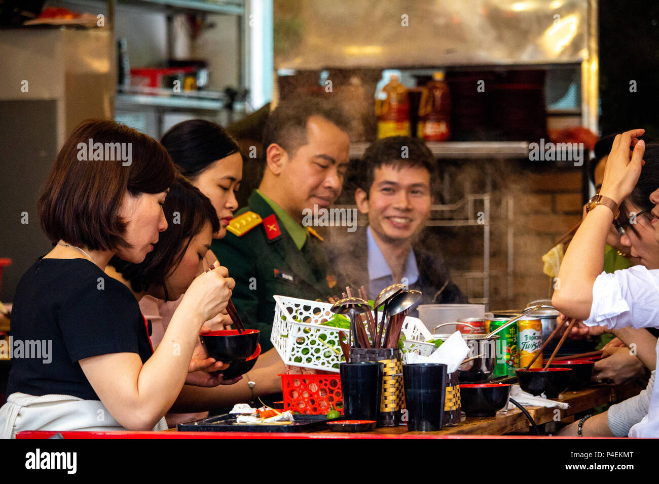 Vietnamese family having dinner hi-res stock photography and images - Alamy