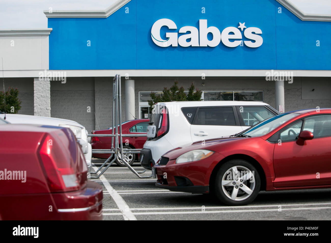 A logo sign outside of a Gabe's retail store in Fredericksburg ...