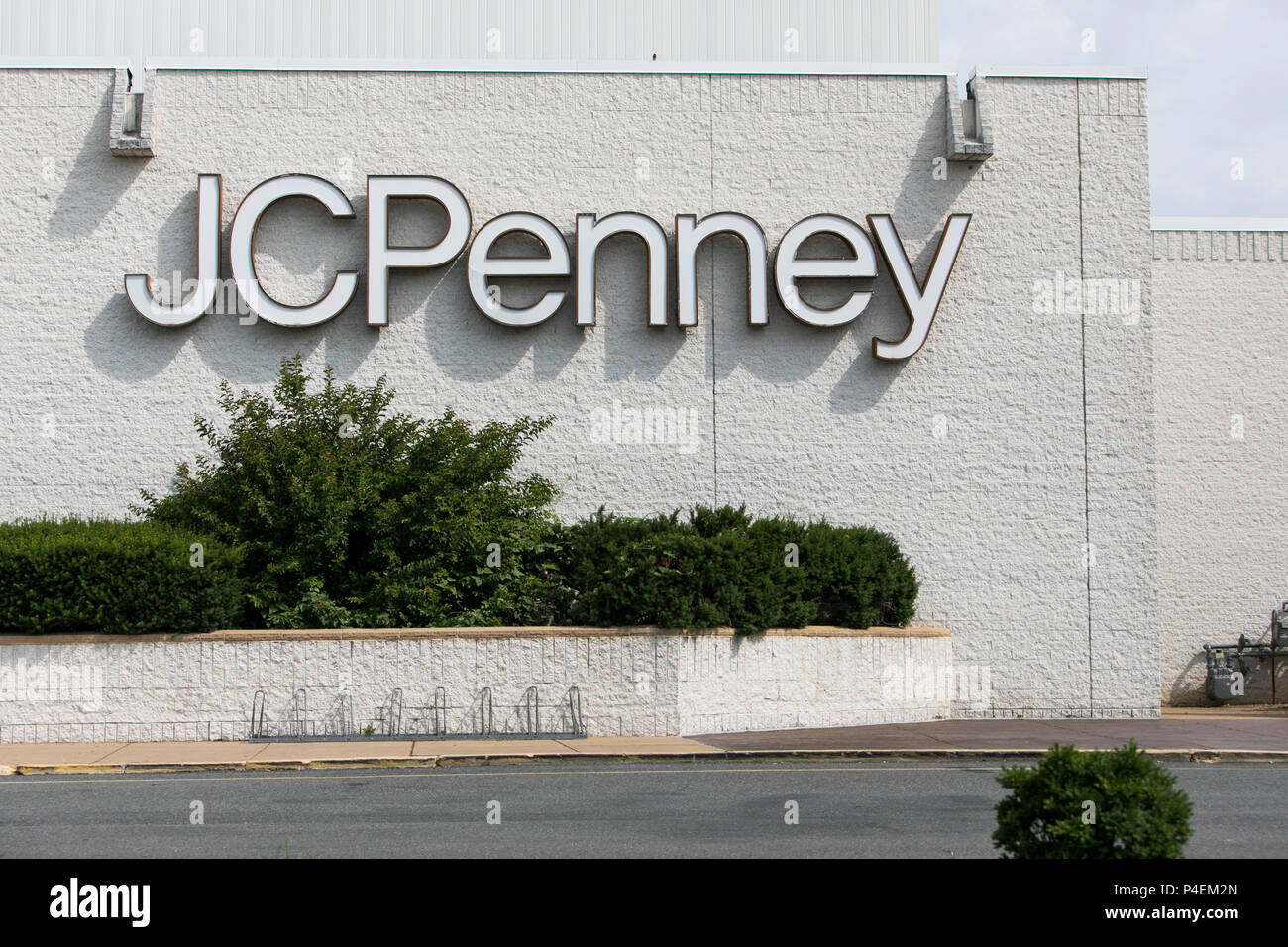 A logo sign outside of a JCPenney retail store in Fredericksburg ...