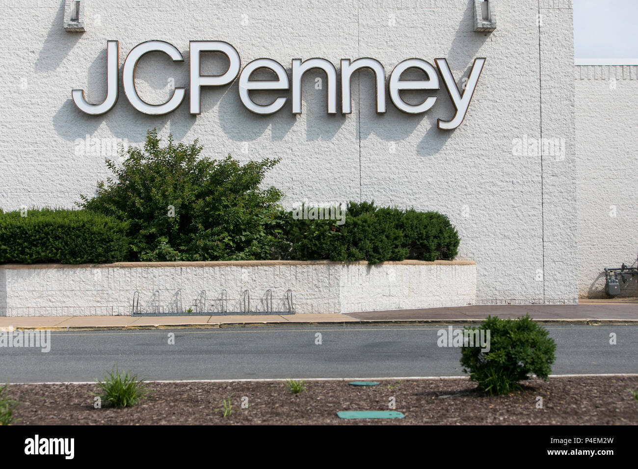 A logo sign outside of a JCPenney retail store in Fredericksburg ...