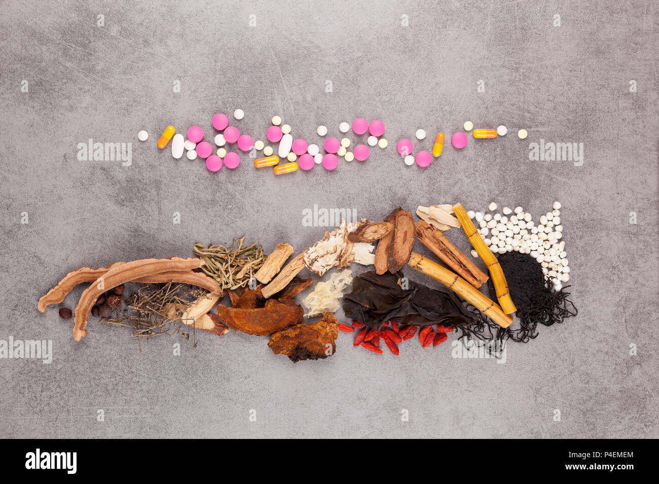 Western and traditional chinese medicine on gray background Stock Photo ...