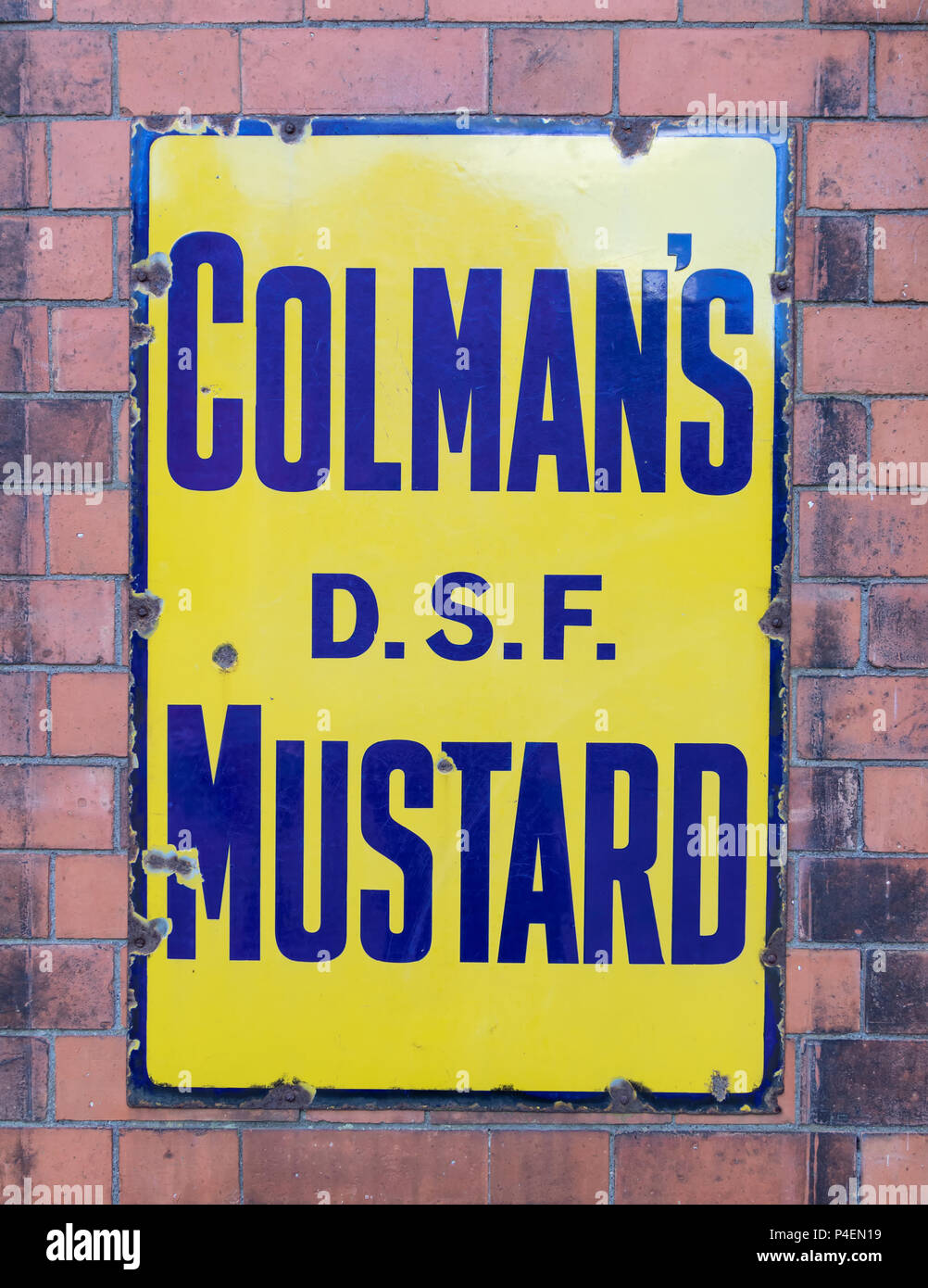 Old enamel Colman's Mustard sign on a wall in Leicestershire, United ...