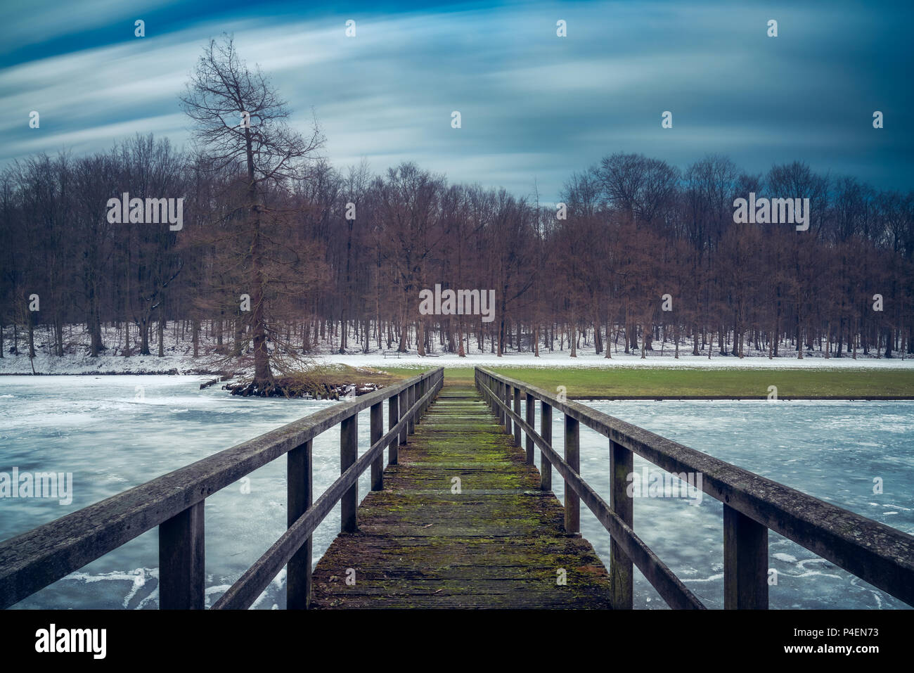 The bridge over the Lake Gover in winter, Gressoney, Mount Rosa, Aosta ...