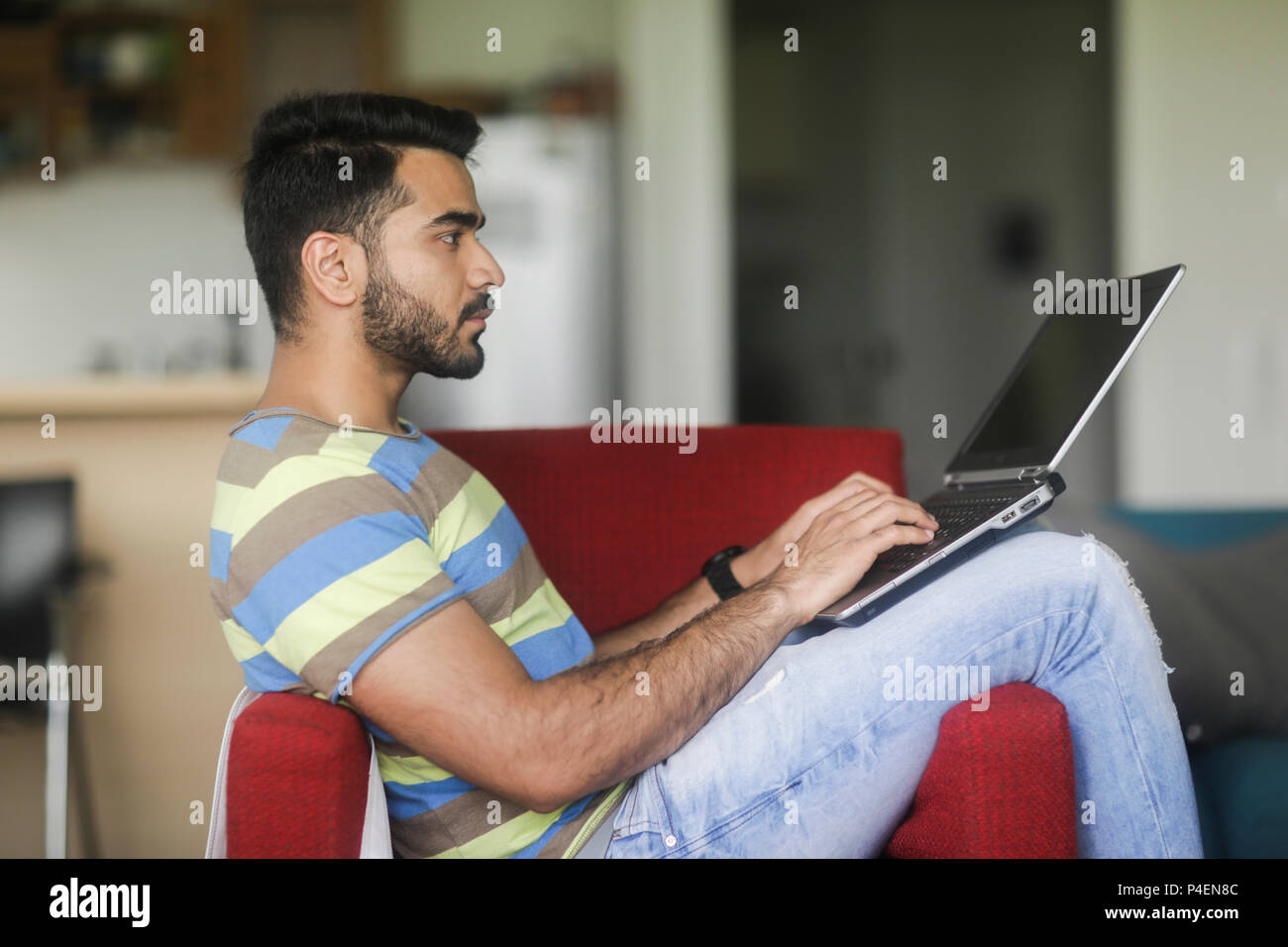 Person sitting using computer typing hi-res stock photography and ...