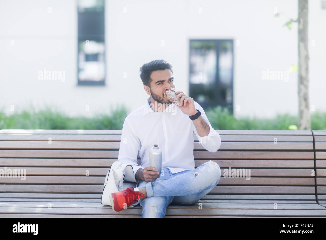 Sitting eating and drinking outdoors hi-res stock photography and ...