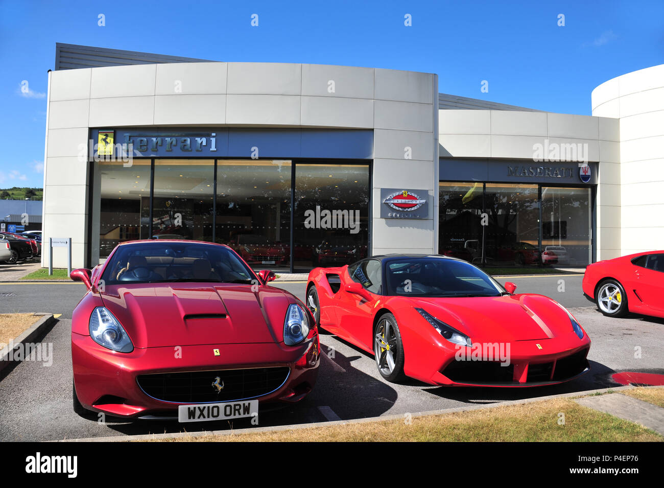 Some of the latest Ferrari cars on display at the Ferrari Dealership in ...