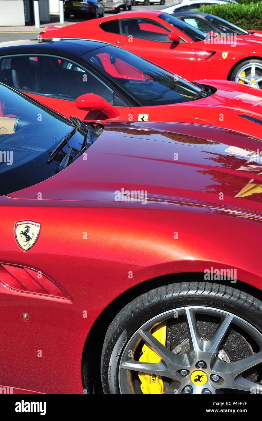 Some of the latest Ferrari cars on display at the Ferrari Dealership in ...