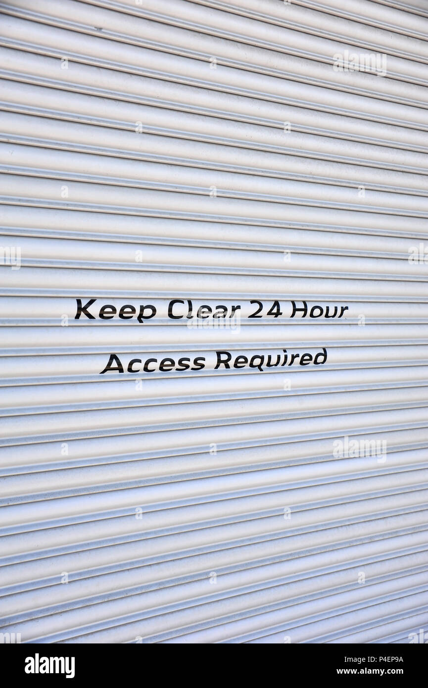 Keep Clear 24 Hour Access Required sign Stock Photo - Alamy
