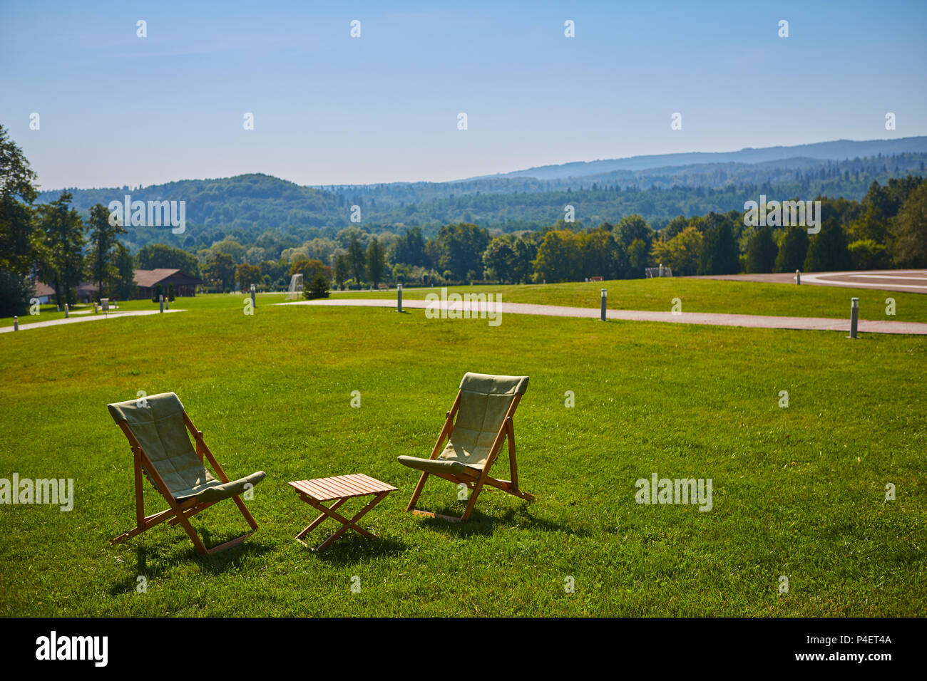 Relax with wooden chair and table. Enjoy the view of garden forest ...