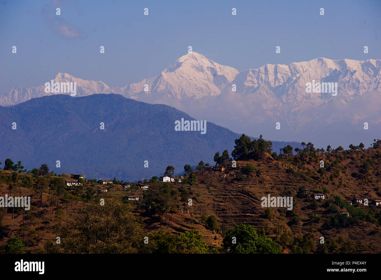 Remote village with Himalayas in the backround, as seen from Lamgara ...