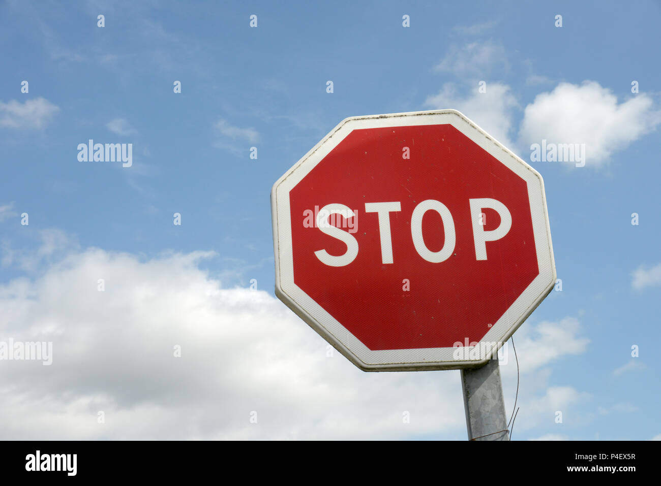Stop sign at a crossroads in Roézé-sur-Sarthe, Pays-de-la-Loire in ...