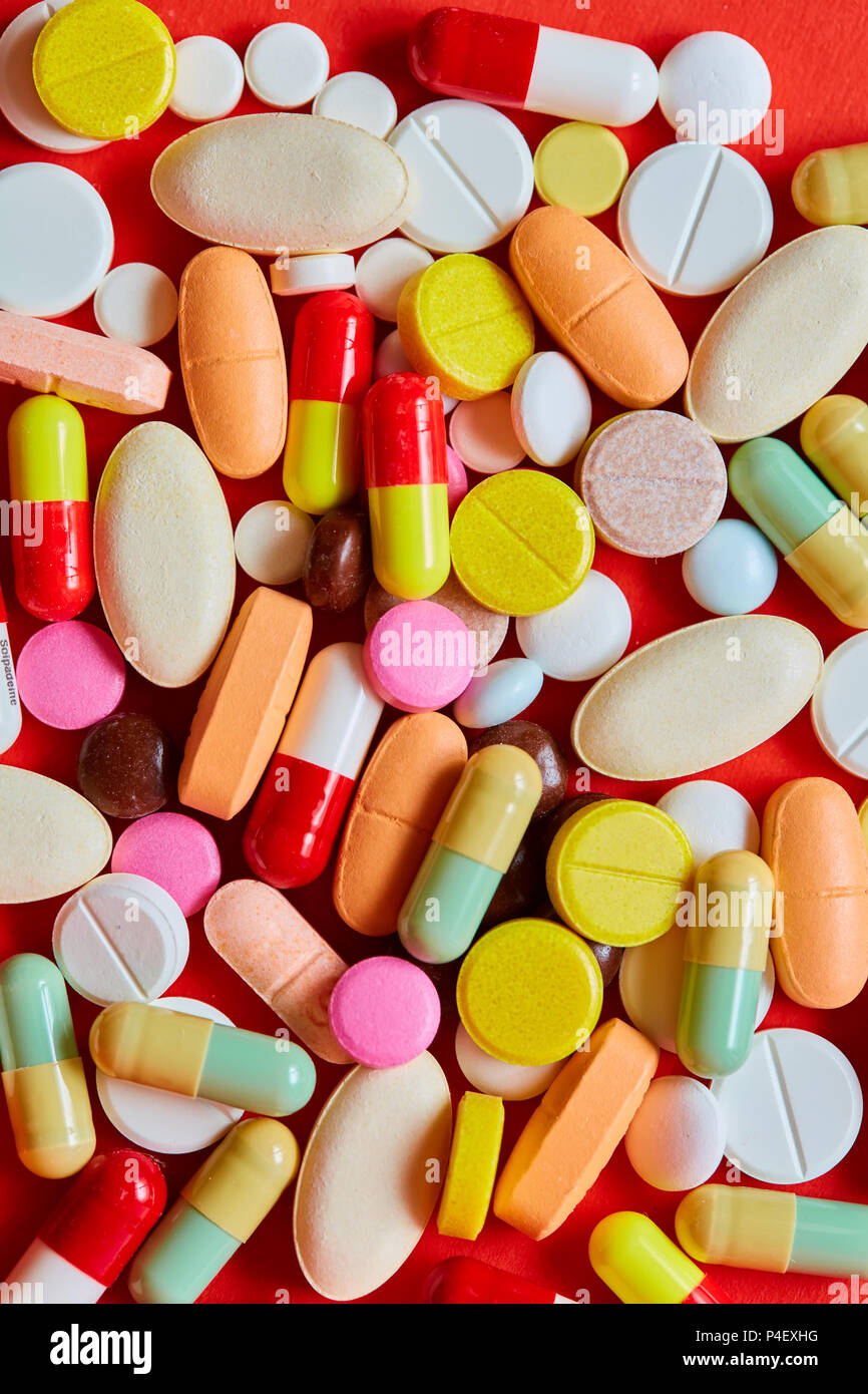 Close up of many colorful pills. Top view with copy space. Medicine ...