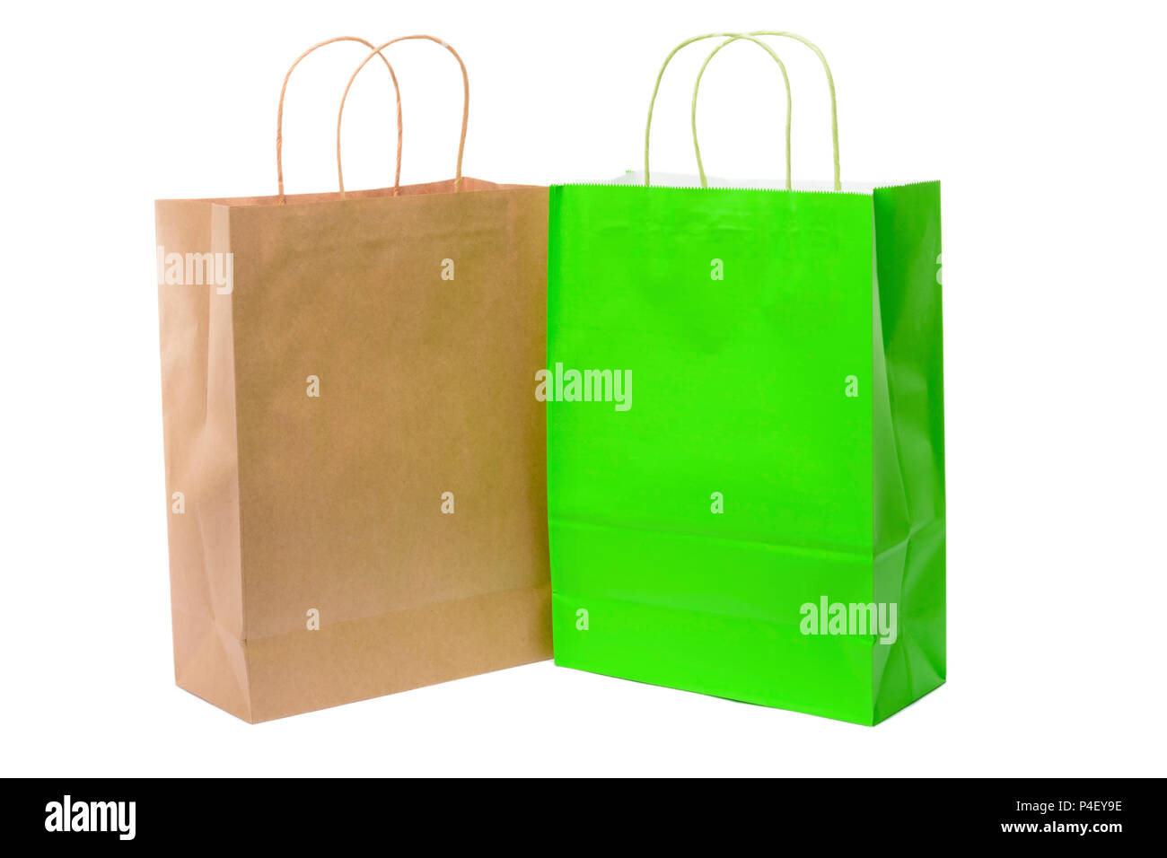 Variety of colored paper shopping bags on white background. Empty area ...