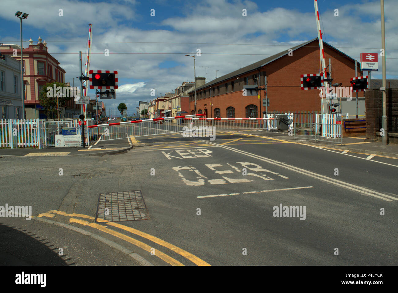 Level crossing at Adrossan railway station, Scotland Stock Photo - Alamy