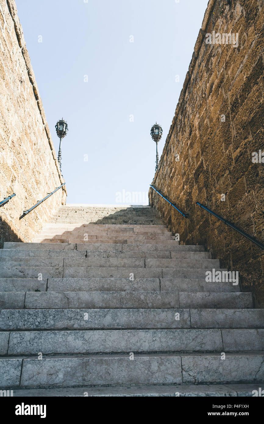 bottom view of stairs with walls and railings Stock Photo - Alamy