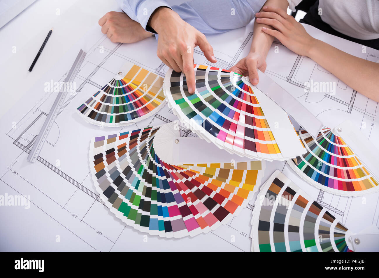 Close-up Of Two Architect's Hand Choosing Color From Various Colorful ...