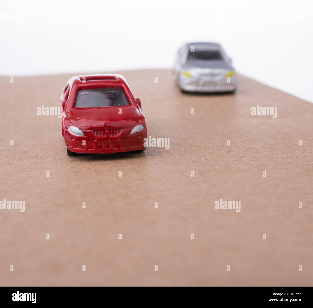 Colorful little toy cars on white background Stock Photo - Alamy