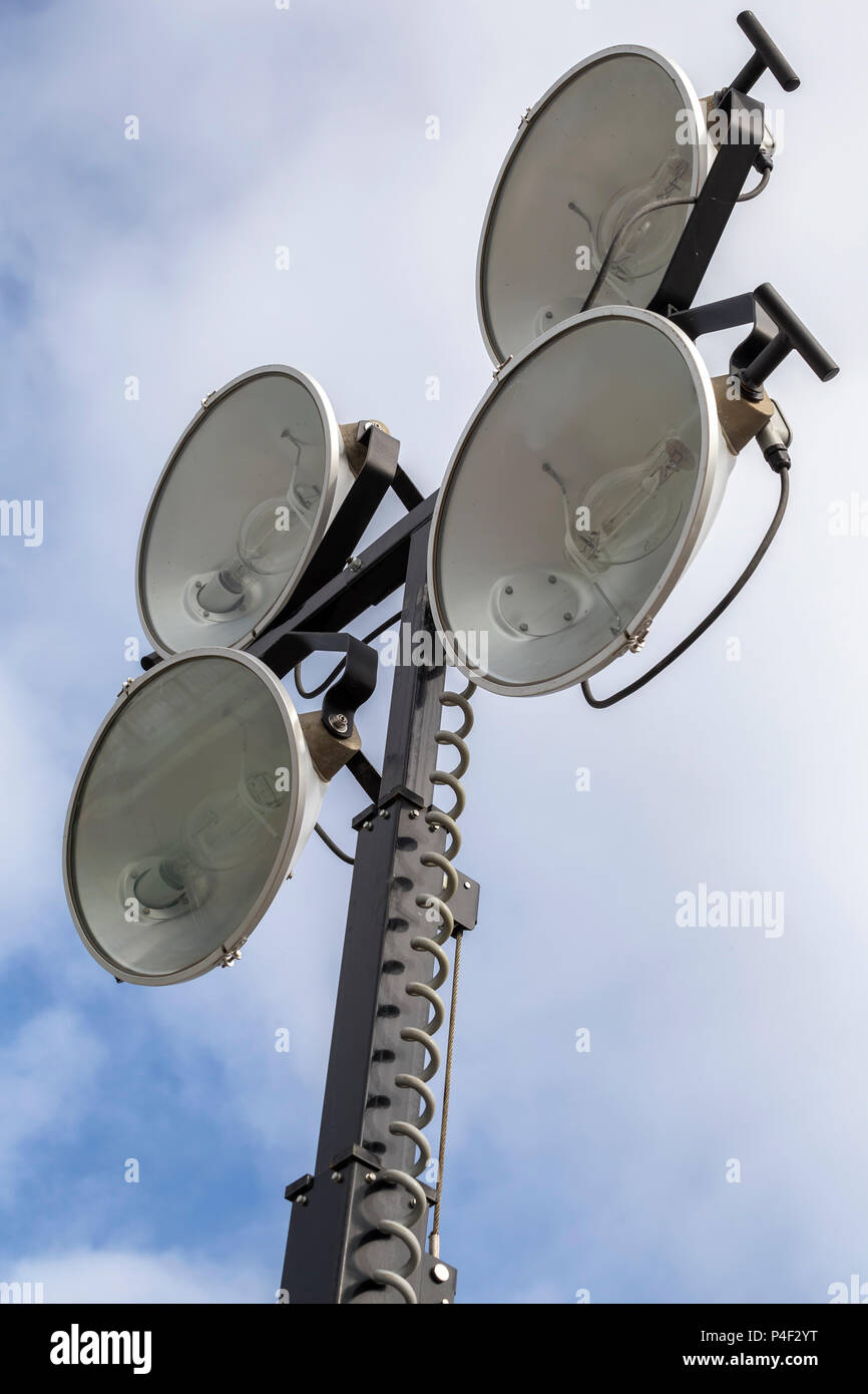 Construction site lighting stand with four spotlights. Portable light ...