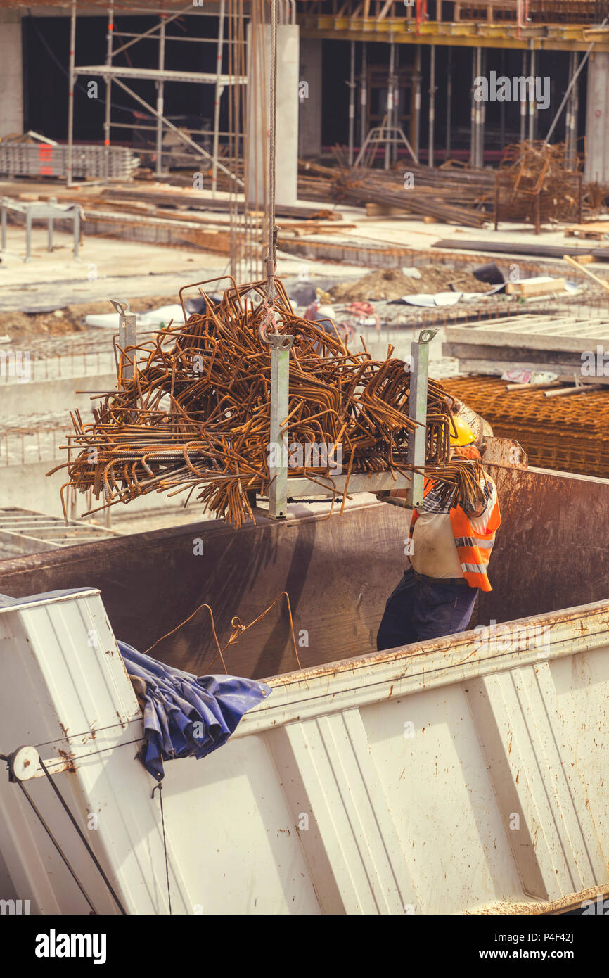 Construction worker lifting rebar hi-res stock photography and images ...