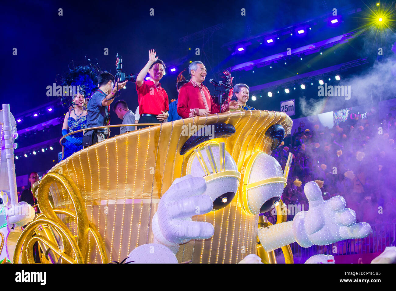 Singapore Prime Minister Lee Hsien Loong in a float procession during ...