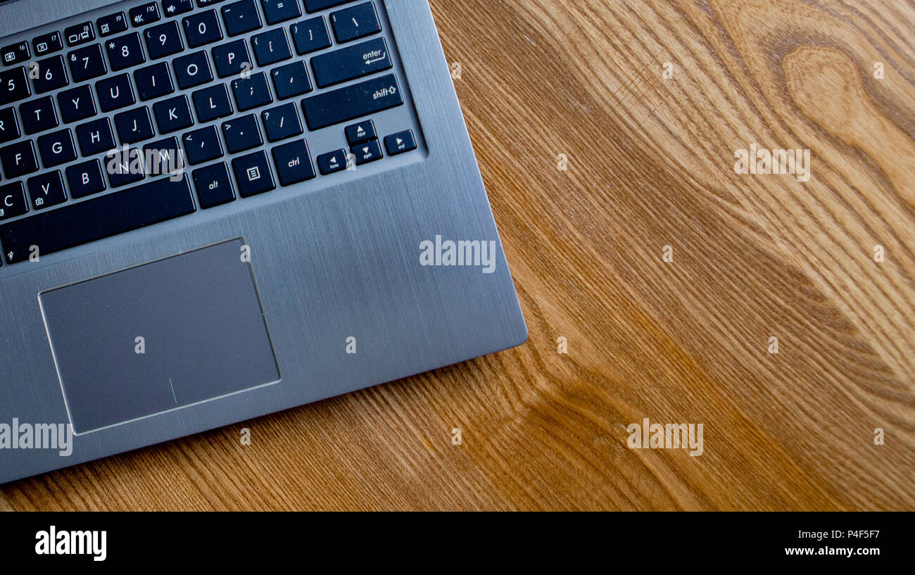 Office desk table with laptop computer. Top view with copy space Stock ...