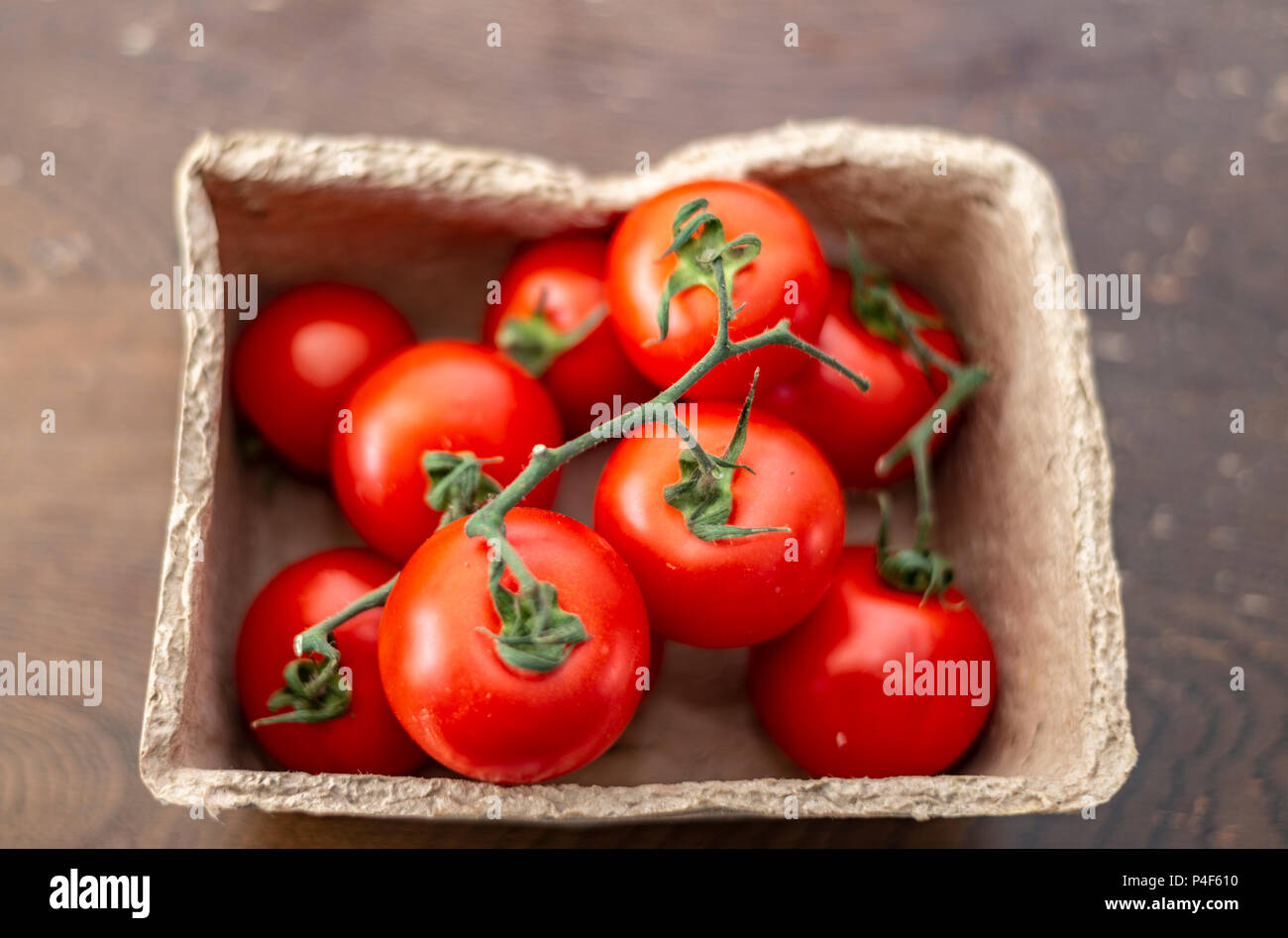 Punnet of tomatoes hi-res stock photography and images - Alamy