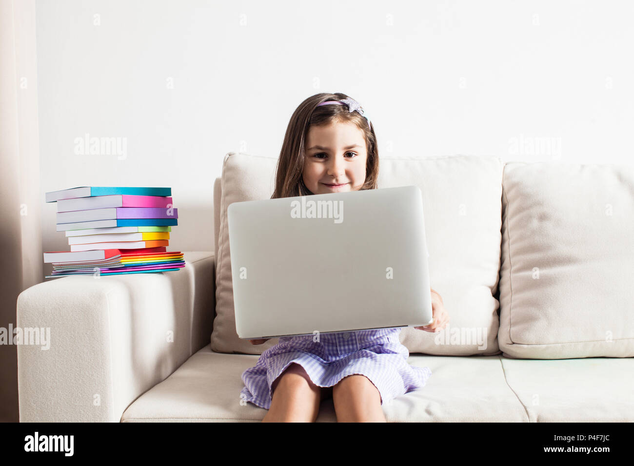 Smiling girl has an idea Stock Photo - Alamy