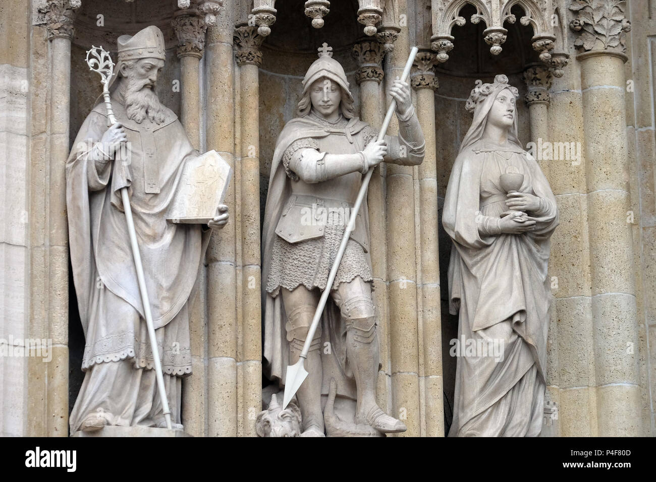 Statue of Saints Methodius, George and Barbara on the portal of the ...