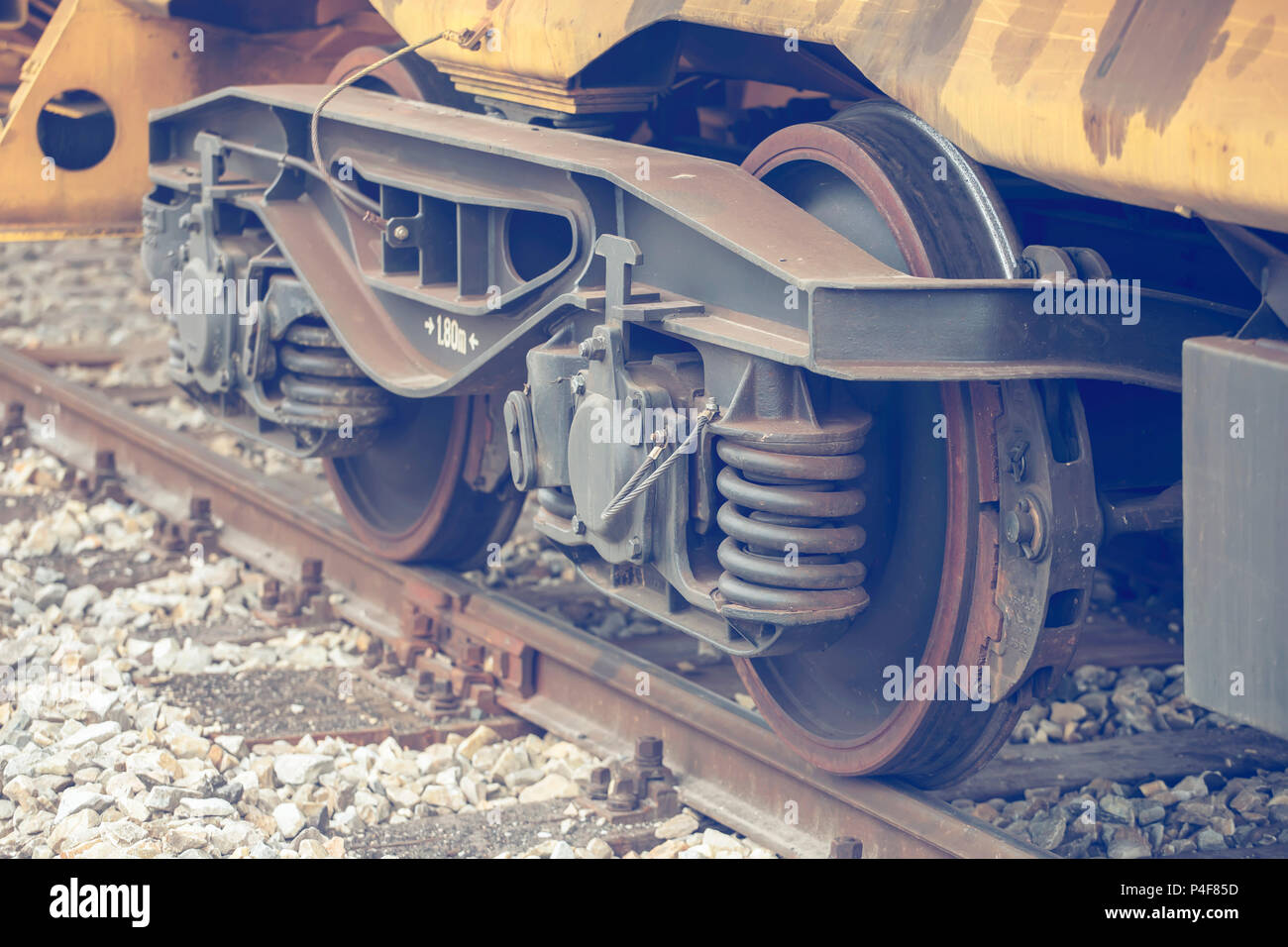 Closeup view of the wheels of a railway wagon. Selective focus and ...
