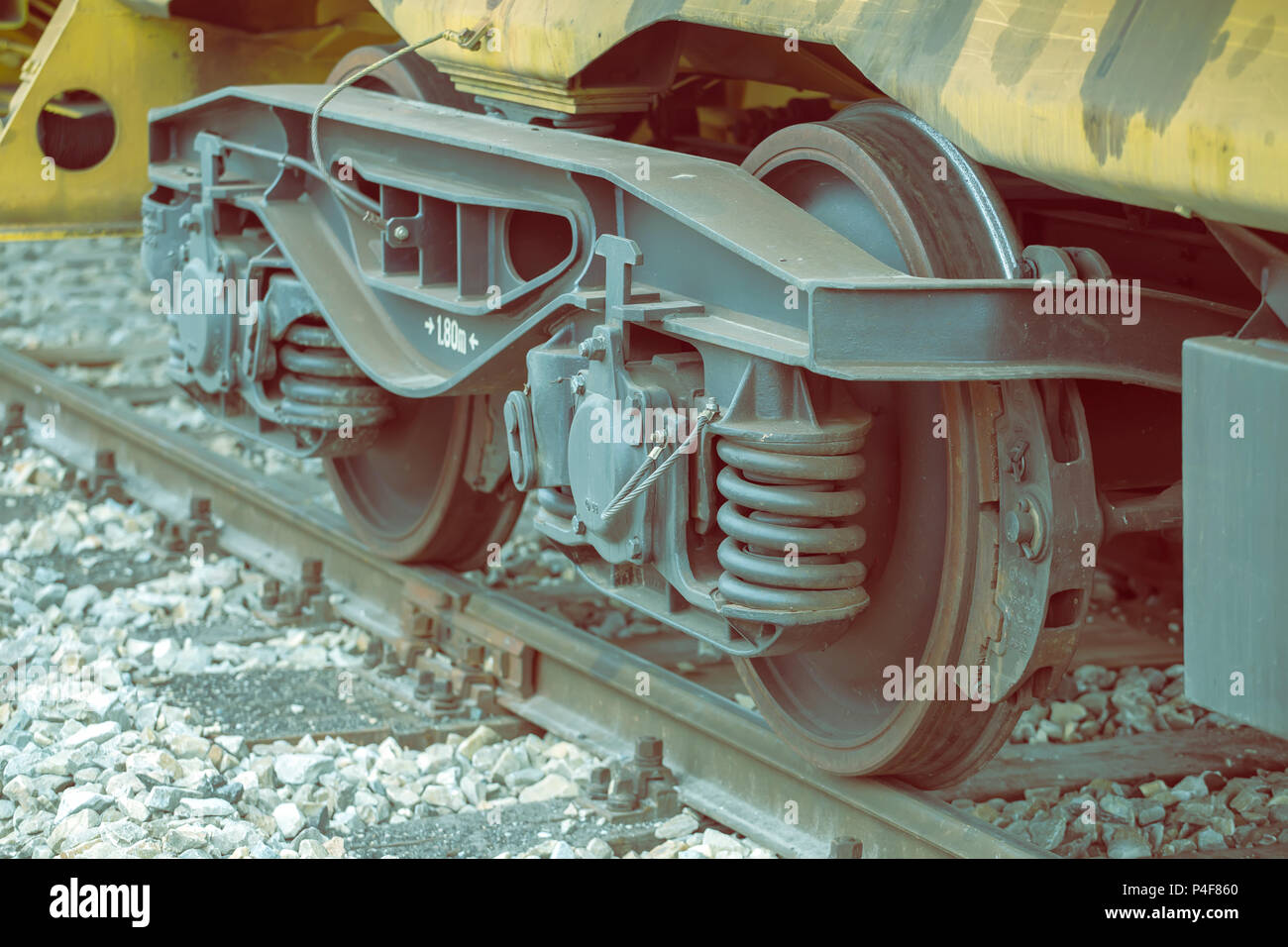 Closeup view of the wheels of a railway wagon. Selective focus and ...