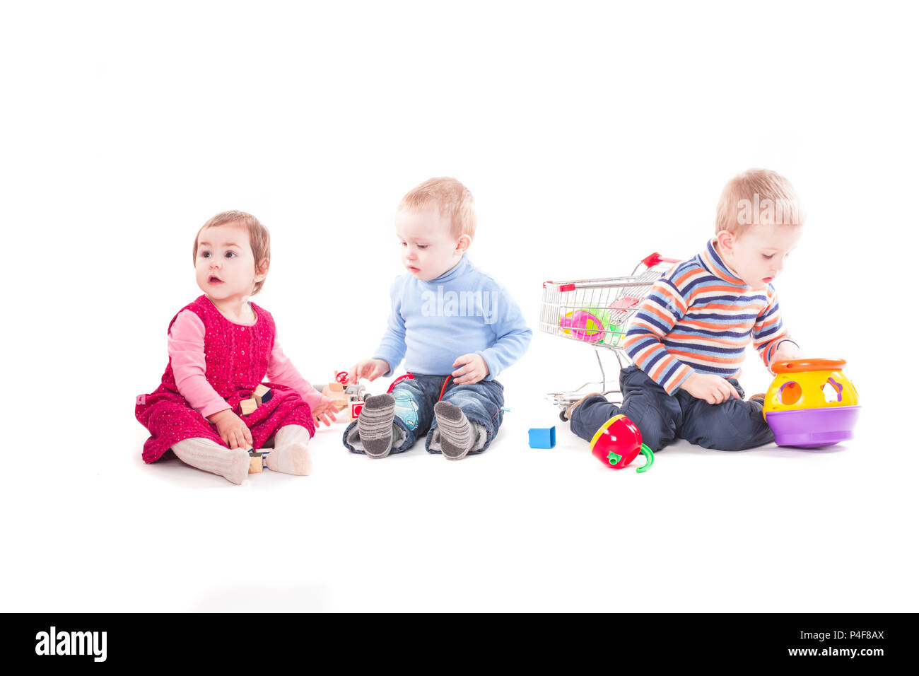 Three children play Stock Photo - Alamy