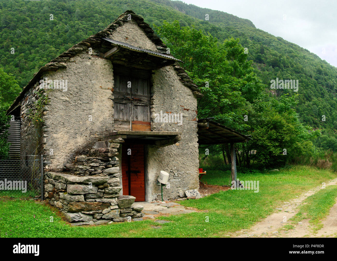 Rustici along the hiking route of the Valle Versasca, Ticino (Italian ...