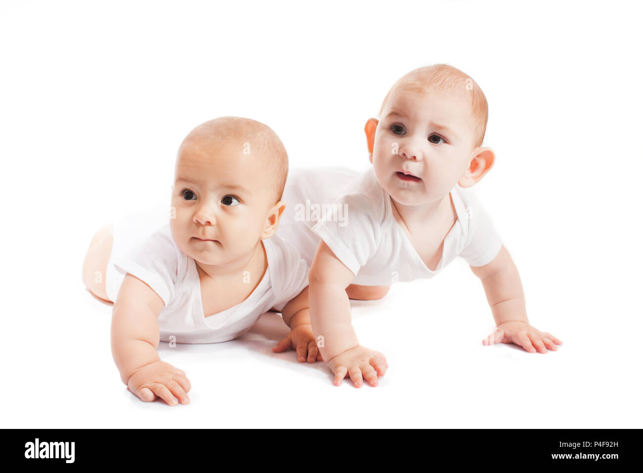 Two baby boys isolated Stock Photo - Alamy