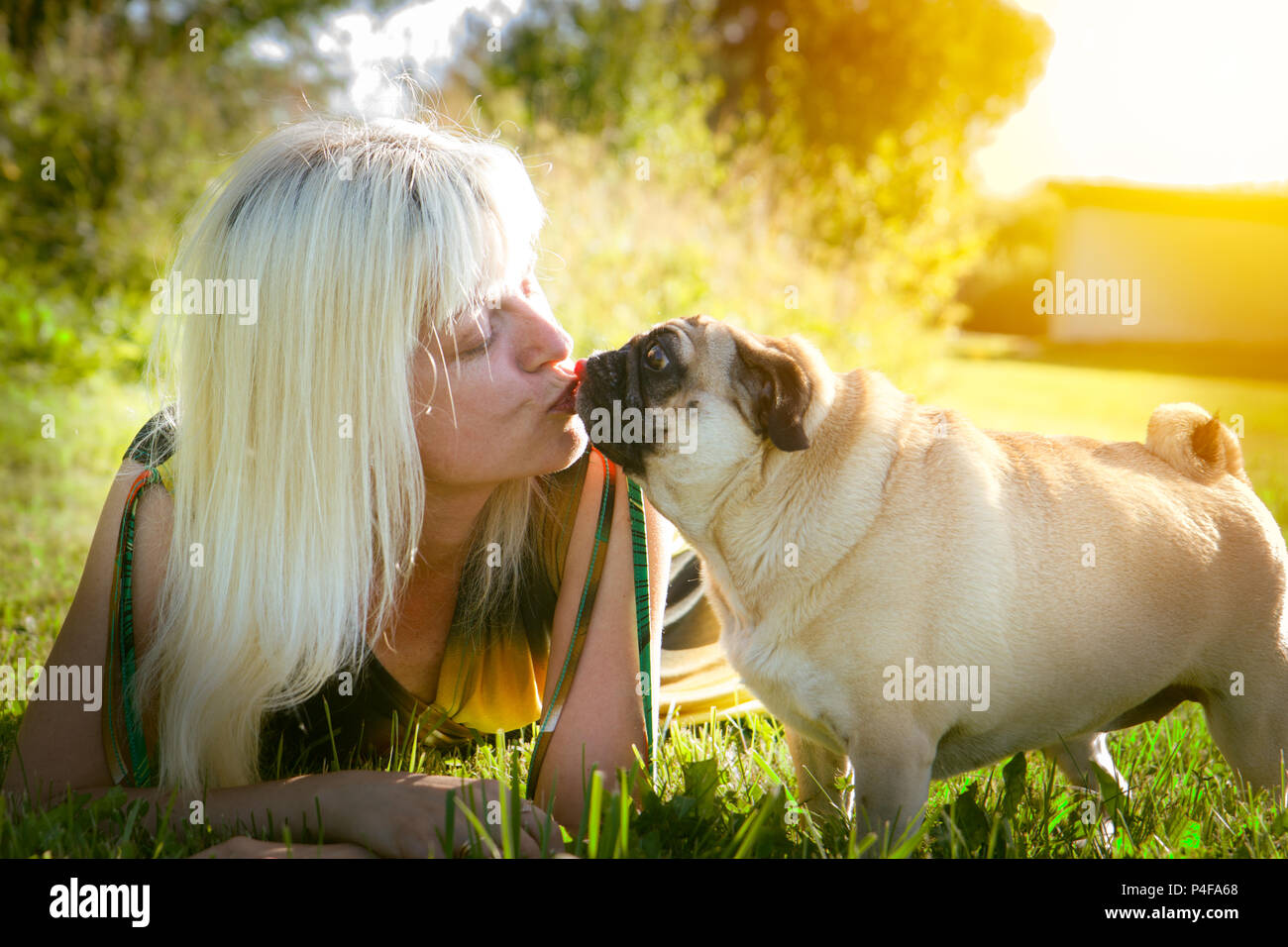 Woman kiss dog hi-res stock photography and images - Alamy