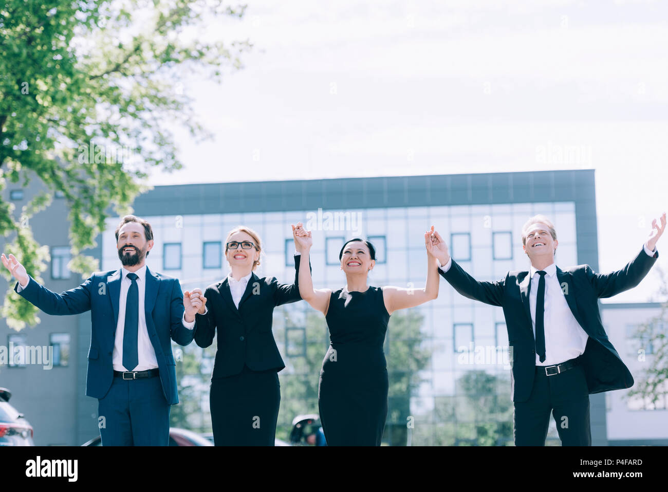 Standing together outside hi-res stock photography and images - Alamy