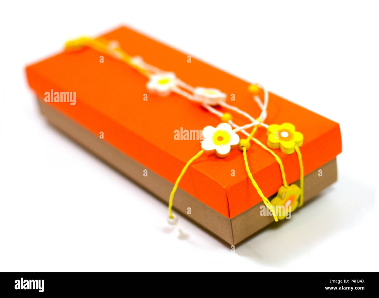 orange gift box with decoration isolated on white background Stock ...