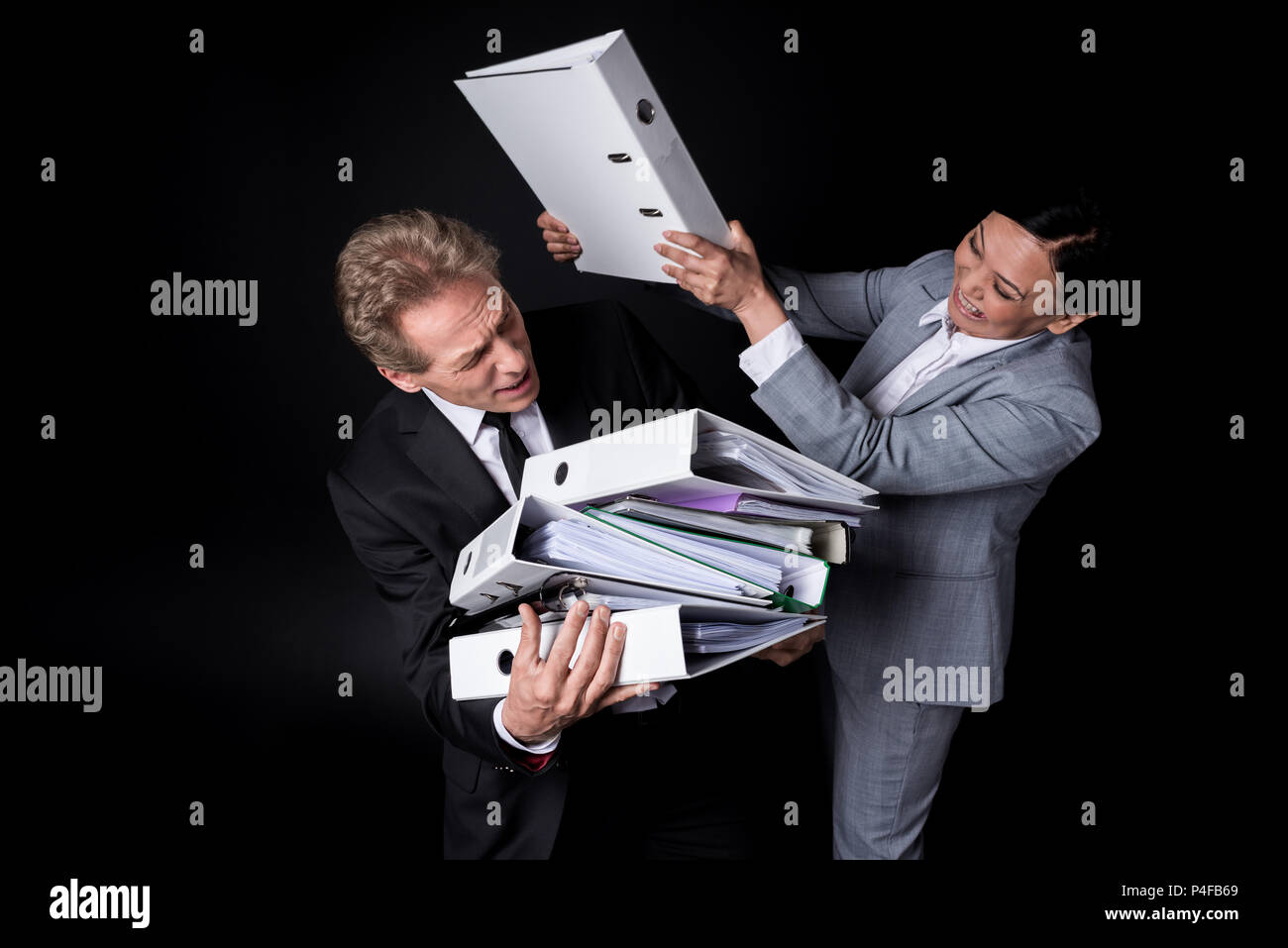 Woman fighting paperwork hi-res stock photography and images - Alamy