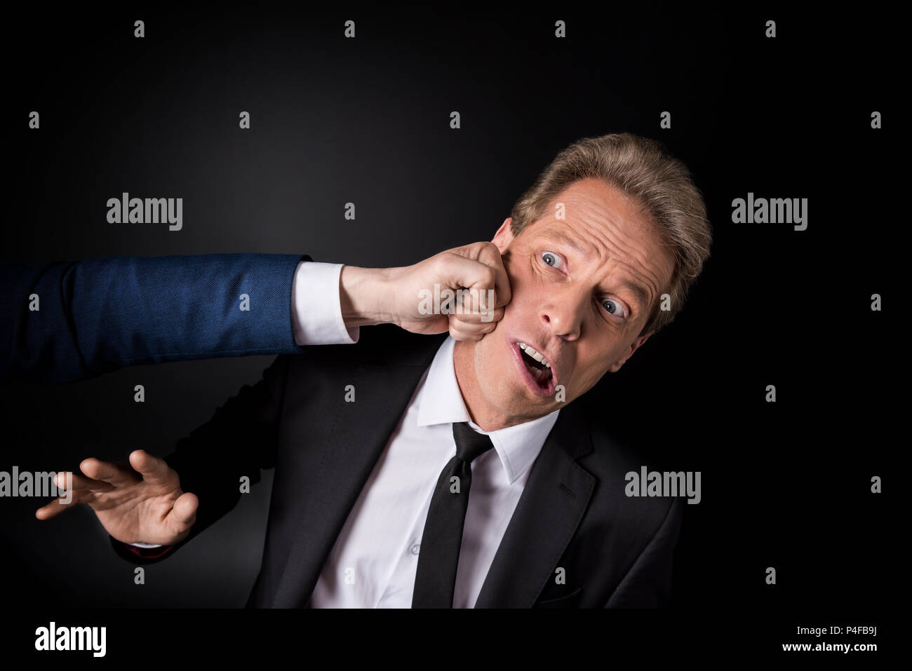 Hand punching hi-res stock photography and images - Alamy