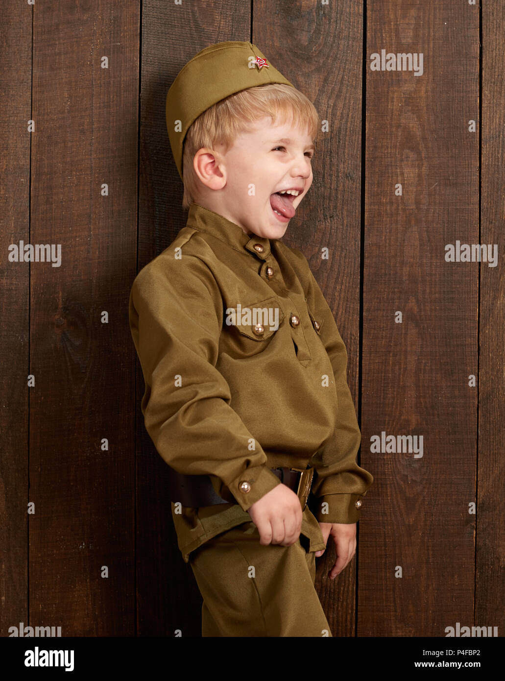 children are dressed as soldier in retro military uniforms Stock Photo ...