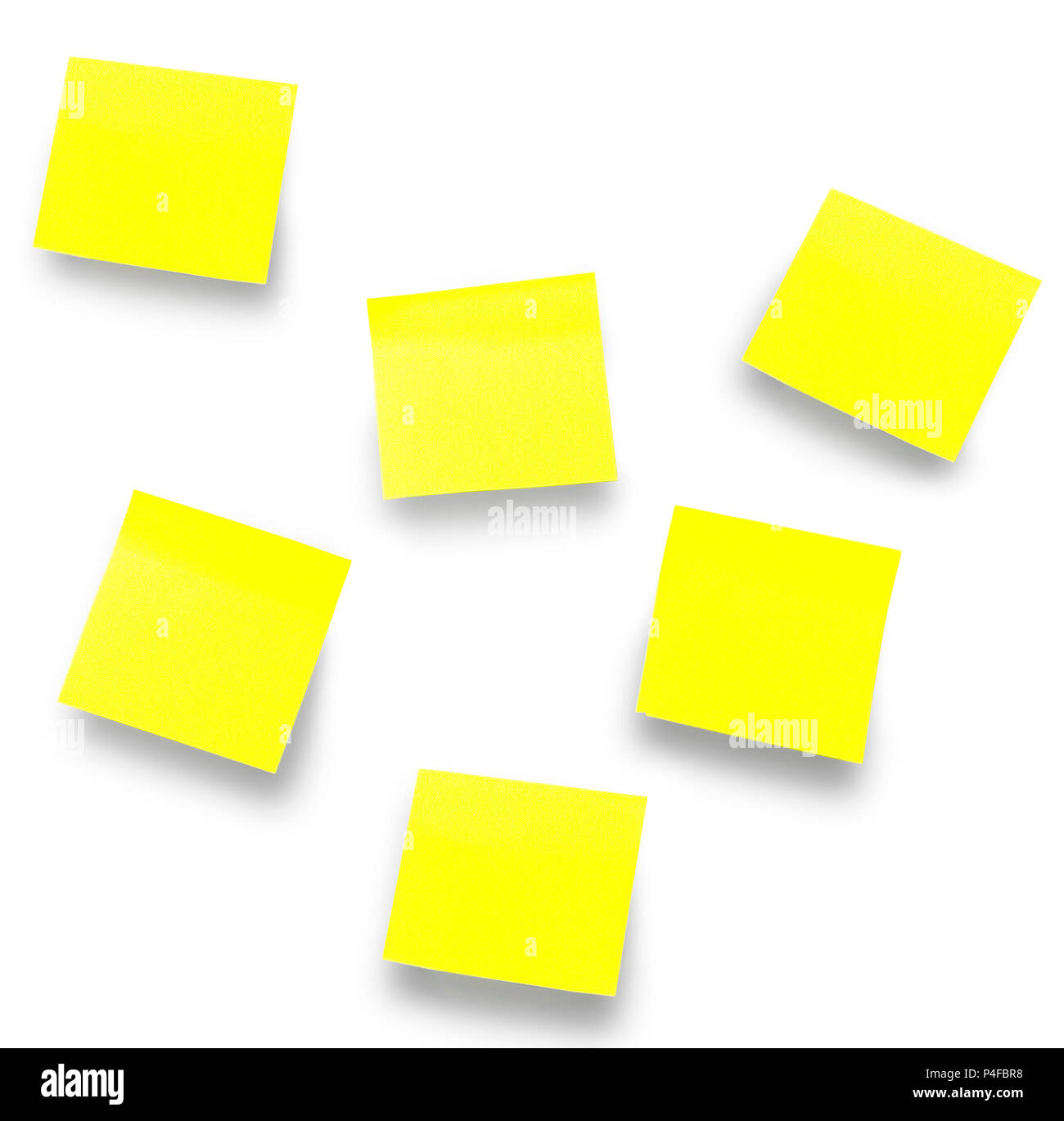 five yellow note papers on white. close-up Stock Photo - Alamy