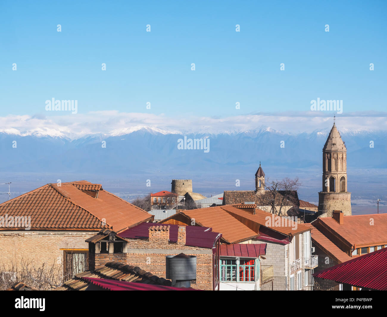 village with ancient architecture and beautiful mountains behind in ...