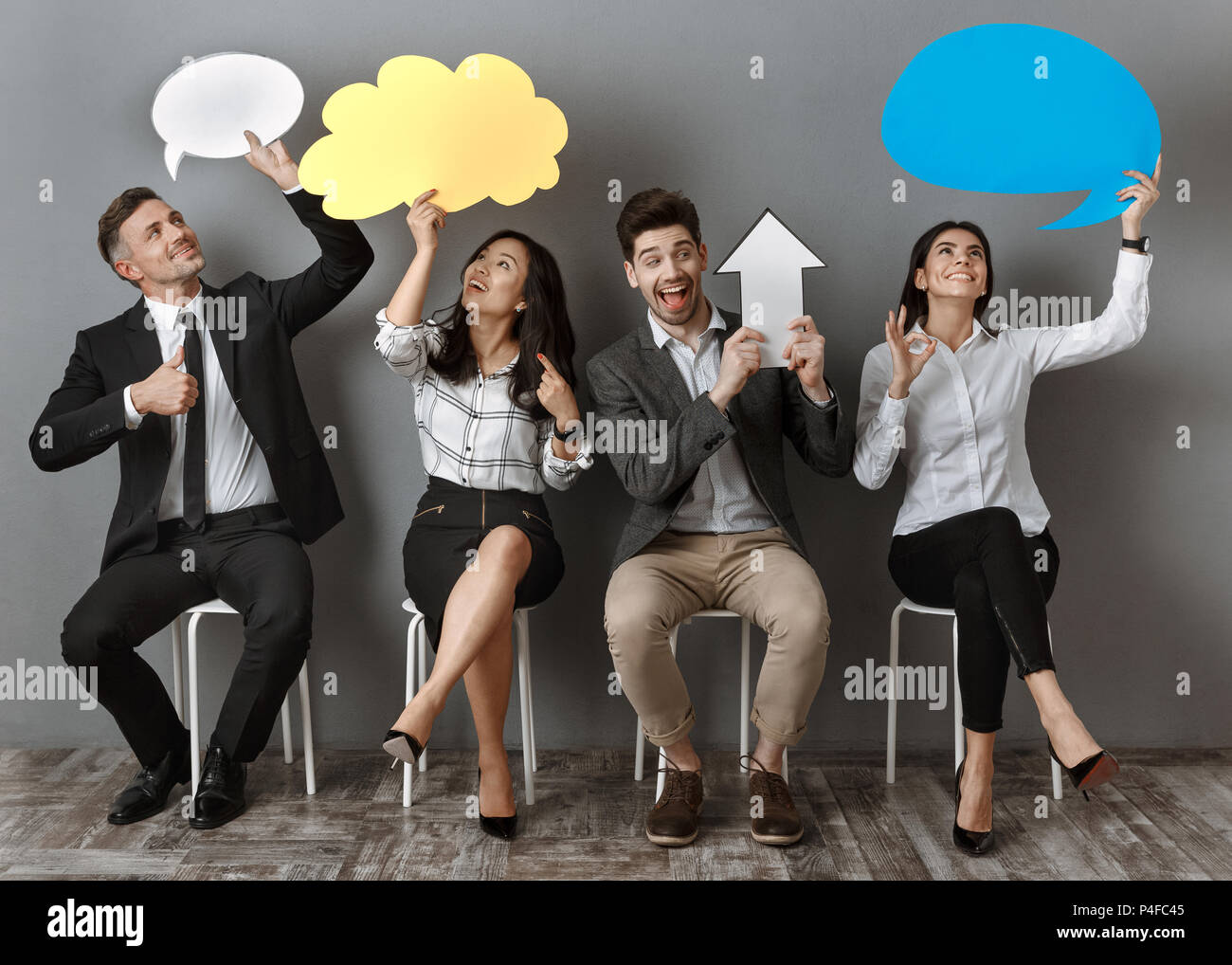 multiethnic business people with paper chat bubbles and arrow waiting ...