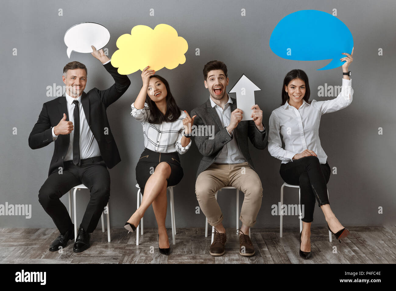 multiethnic business people with paper chat bubbles and arrow waiting ...