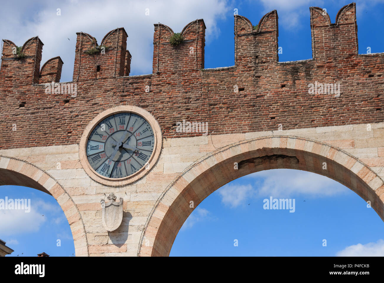 A marble and red-brick gateway called Portoni della Bra with an ...