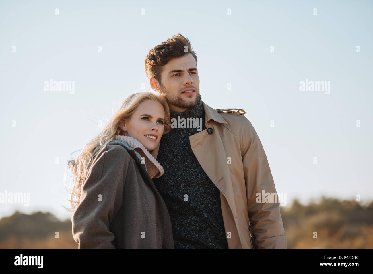 Young beautiful couple embracing hi-res stock photography and images - Alamy