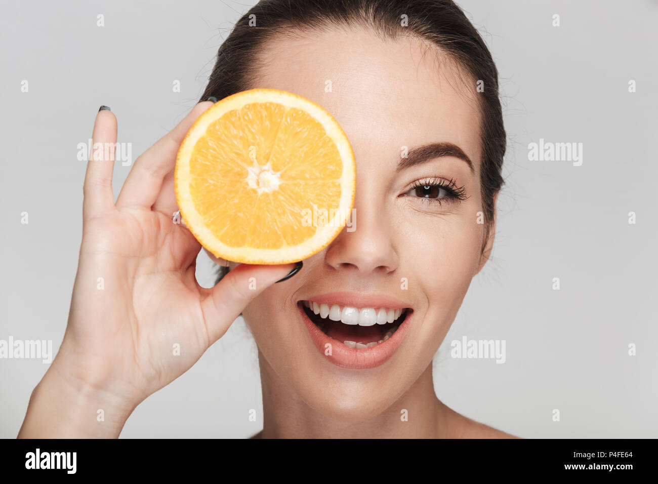 Woman covering one eye hi-res stock photography and images - Alamy