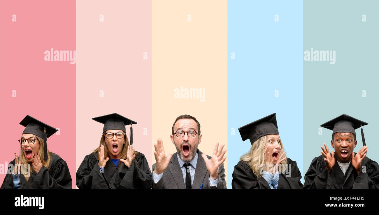 Senior teacher with his graduate students stressful keeping hands on ...