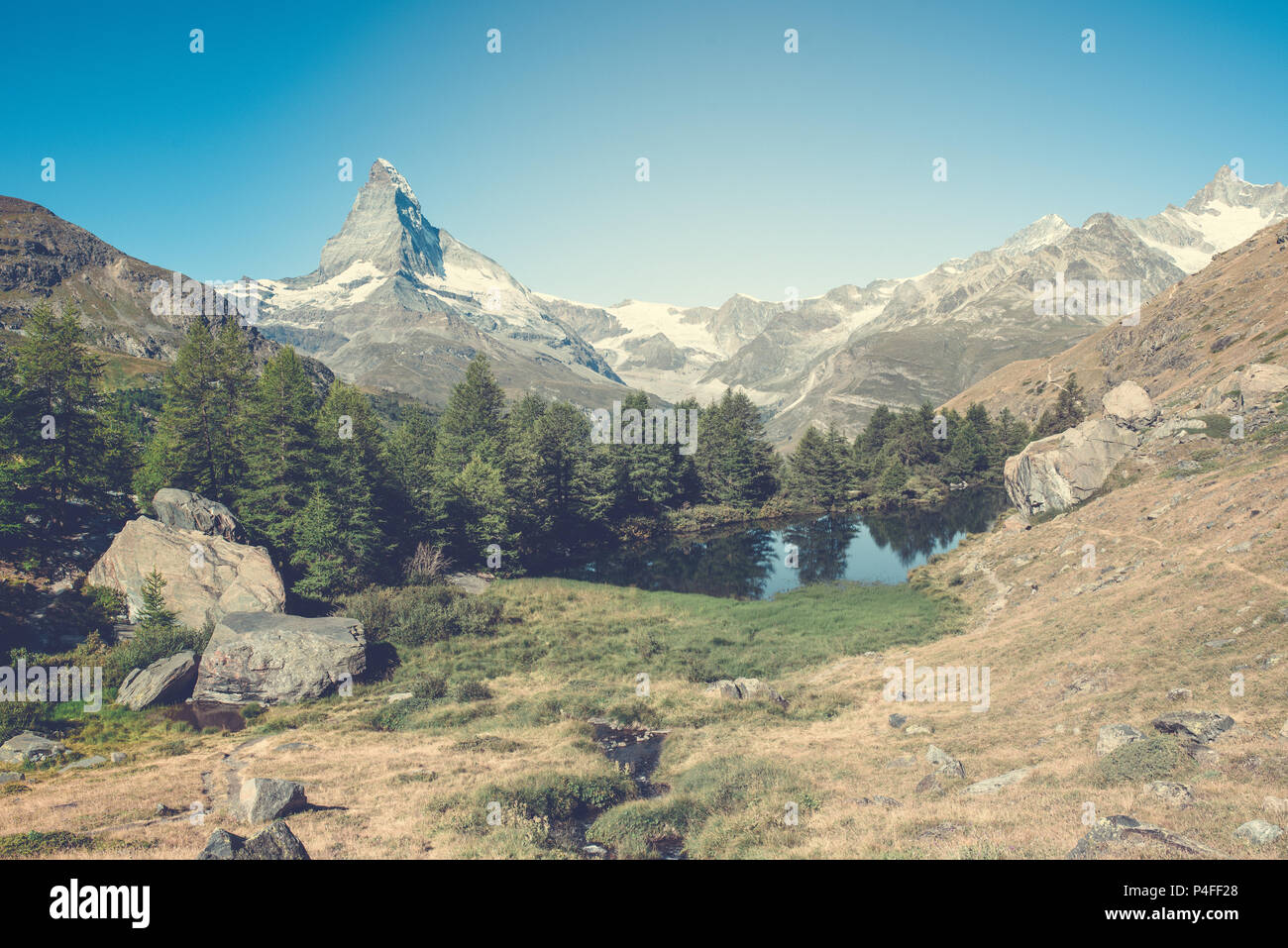 Grindjisee - beautiful lake with reflection of Matterhorn at Zermatt ...