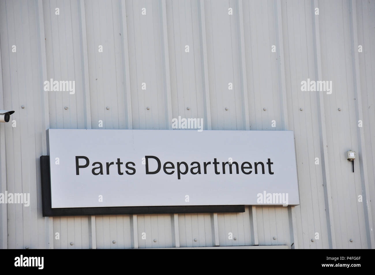 Car dealership Parts Department Sign on garage wall Stock Photo - Alamy